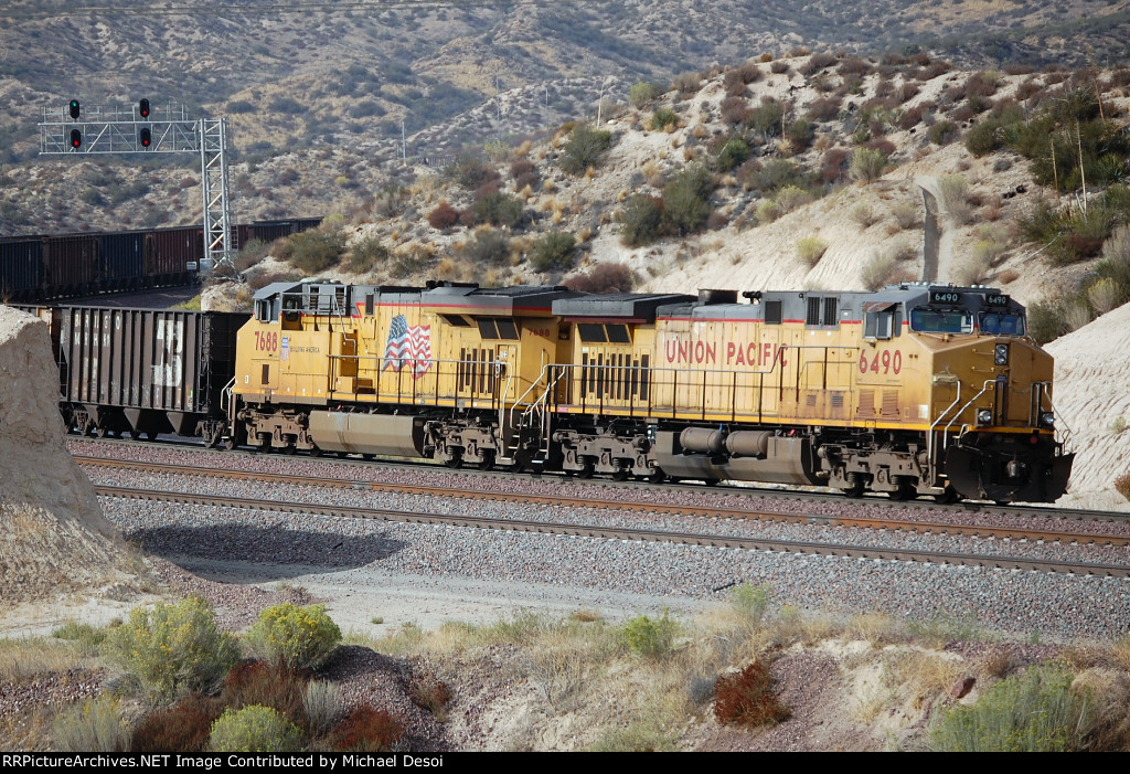UP AC-4400CW #6490 is part of the DPU on this westbound coal train